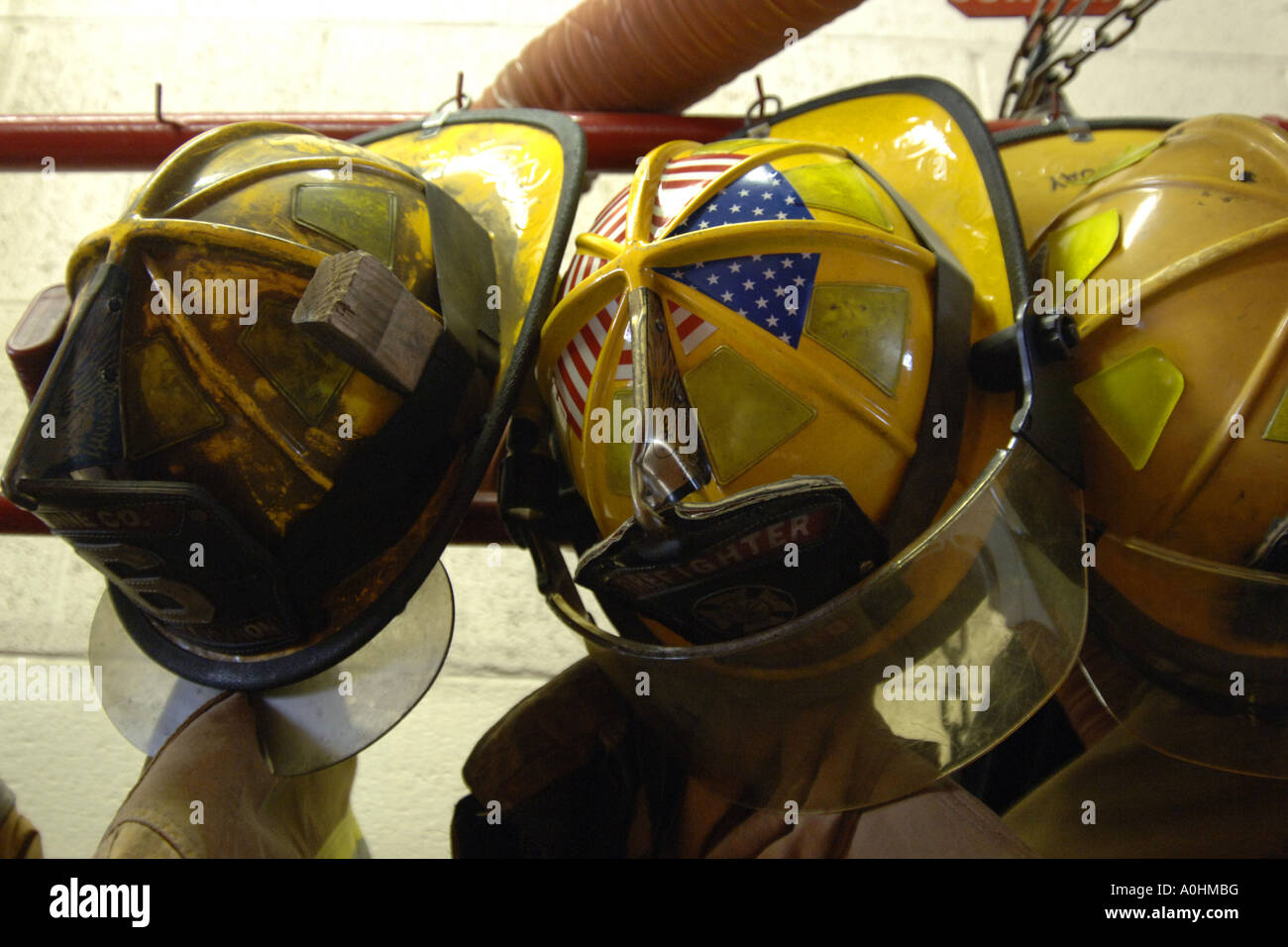 Yellow firefighters helmets Stock Photo - Alamy