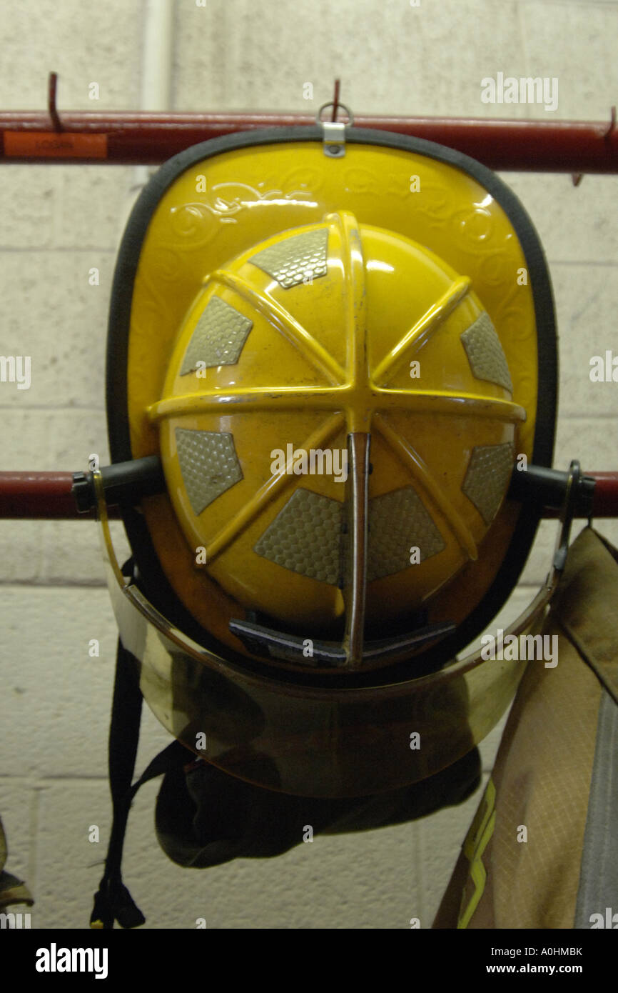 Yellow firefighters helmet Stock Photo - Alamy