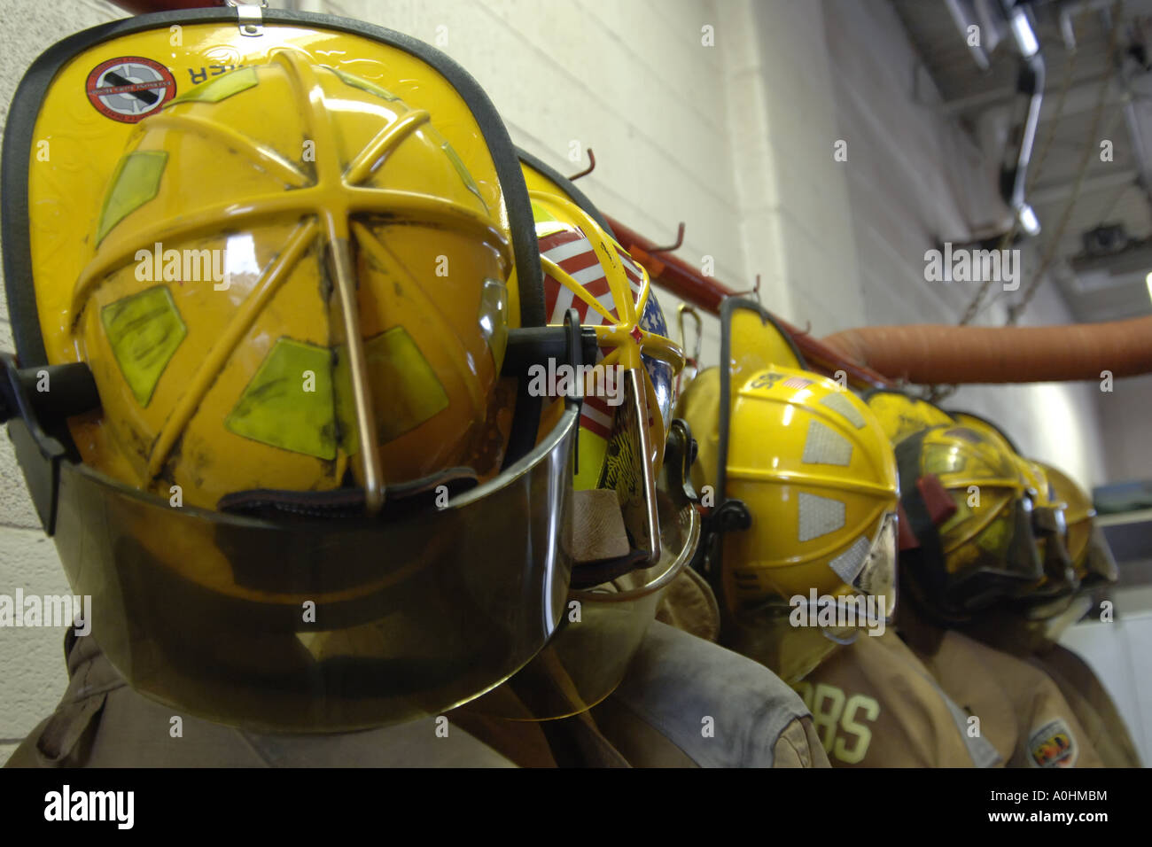 Yellow firefighters helmets Stock Photo - Alamy