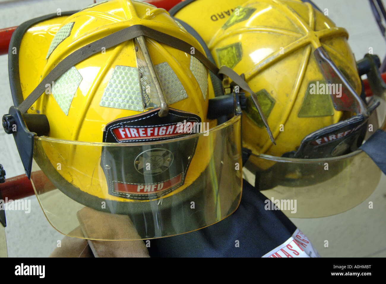 Yellow firefighters helmets Stock Photo - Alamy