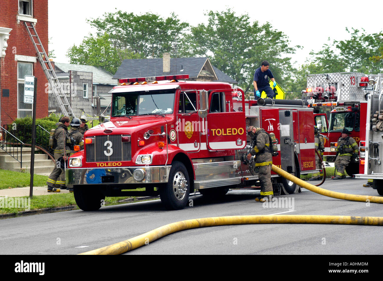 Firefighters in action at a fire in downtown Toledo, Ohio Stock Photo ...