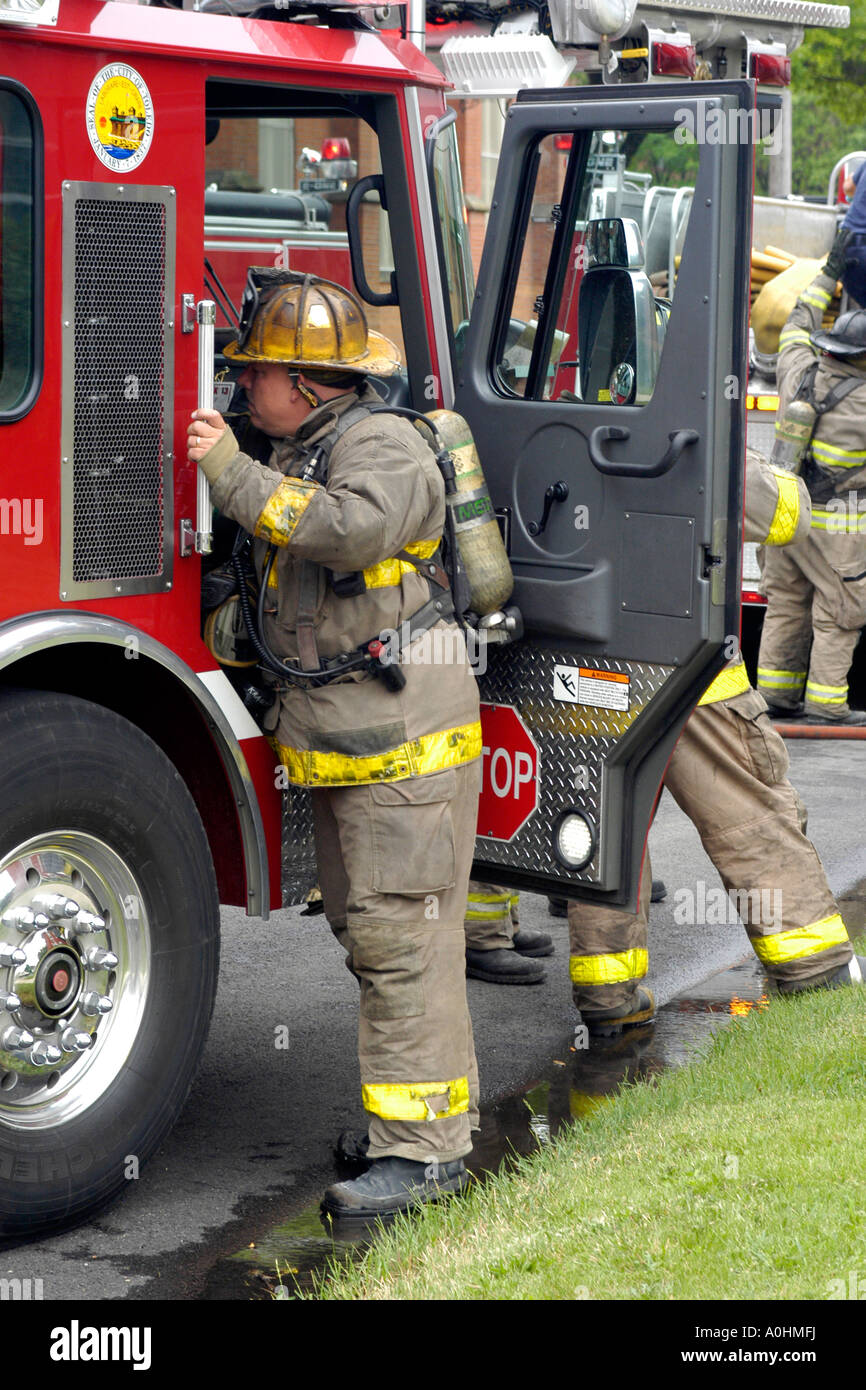 Firefighters on the job in downtown Toledo Ohio wearing breathing ...