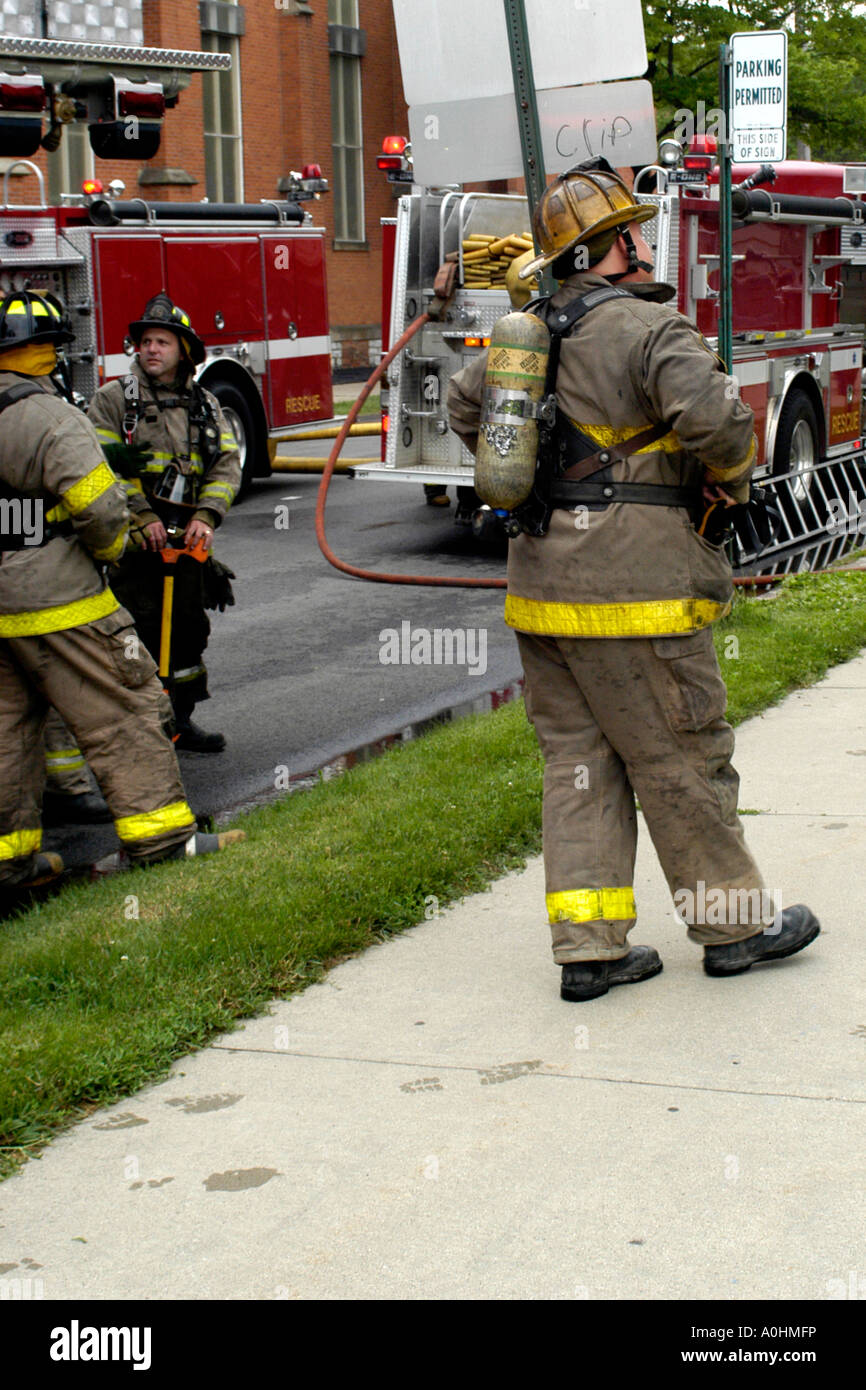 Firefighters on the job in downtown Toledo Ohio wearing breathing ...