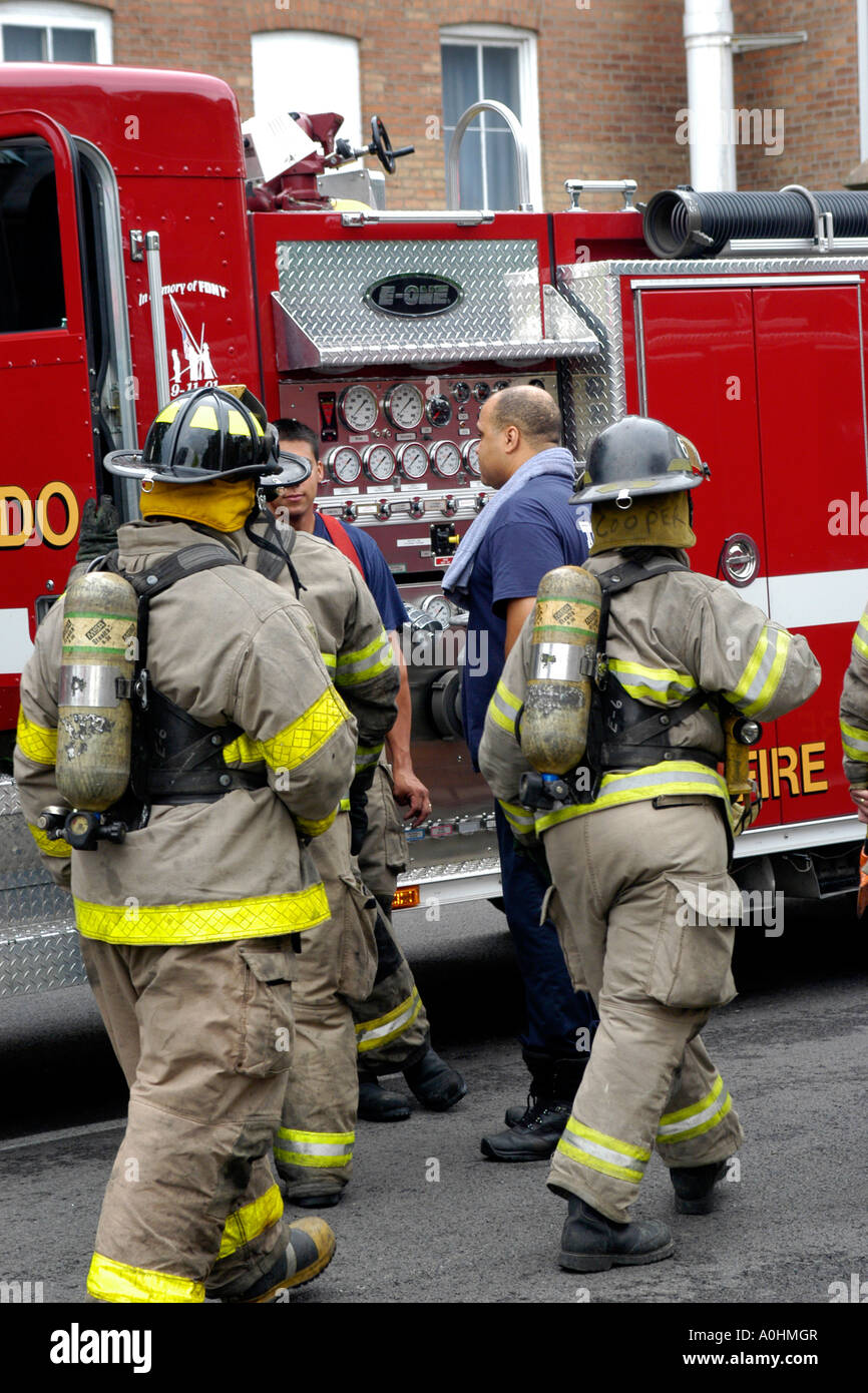 Firefighters on the job in downtown Toledo Ohio wearing breathing ...