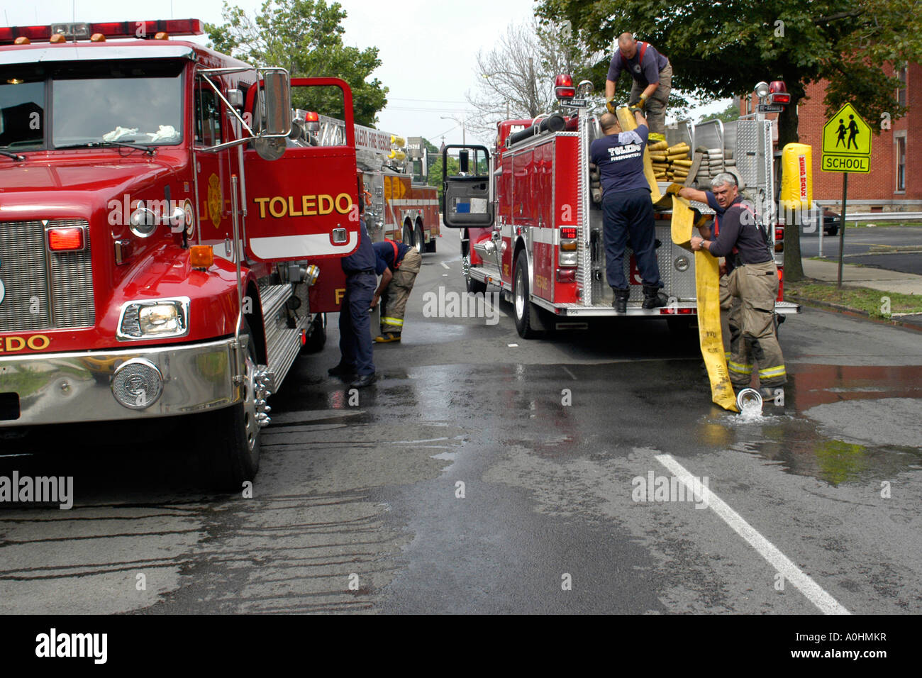 Firefighters at a house in downtown Toledo Ohio Stock Photo - Alamy