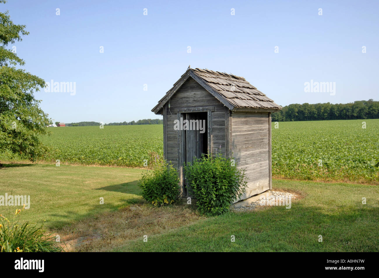 Old fashioned outside toilet house Stock Photo - Alamy