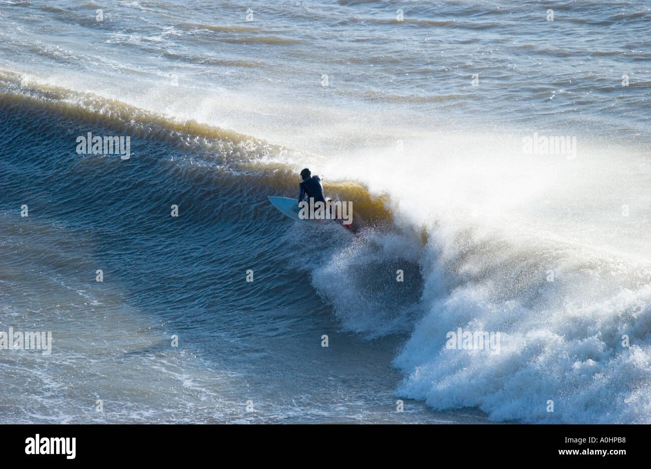 Surfing winter waves Fall Bay Gower peninsula Stock Photo - Alamy