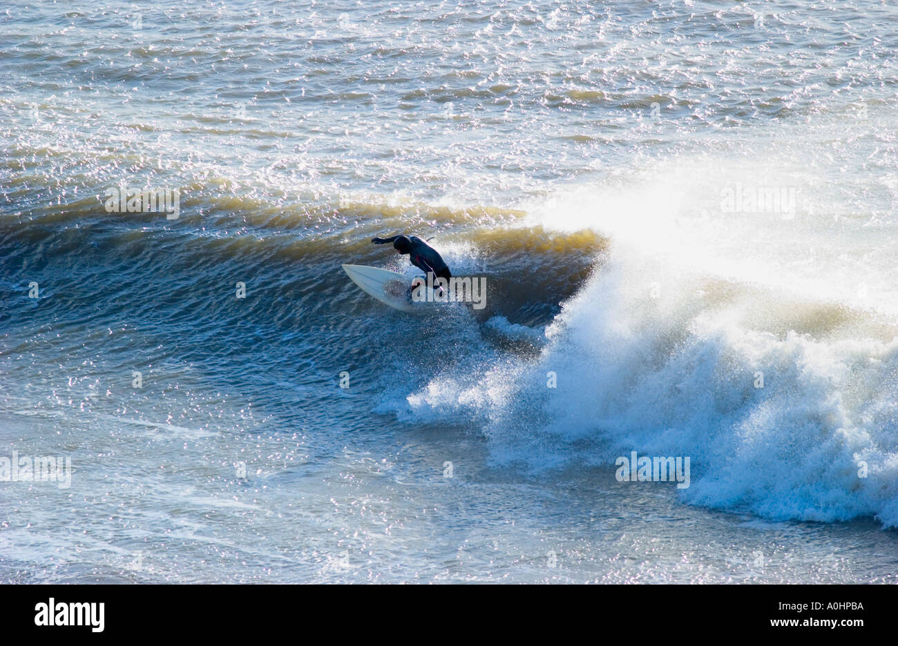 Surfing winter waves Fall Bay Gower peninsula Stock Photo - Alamy