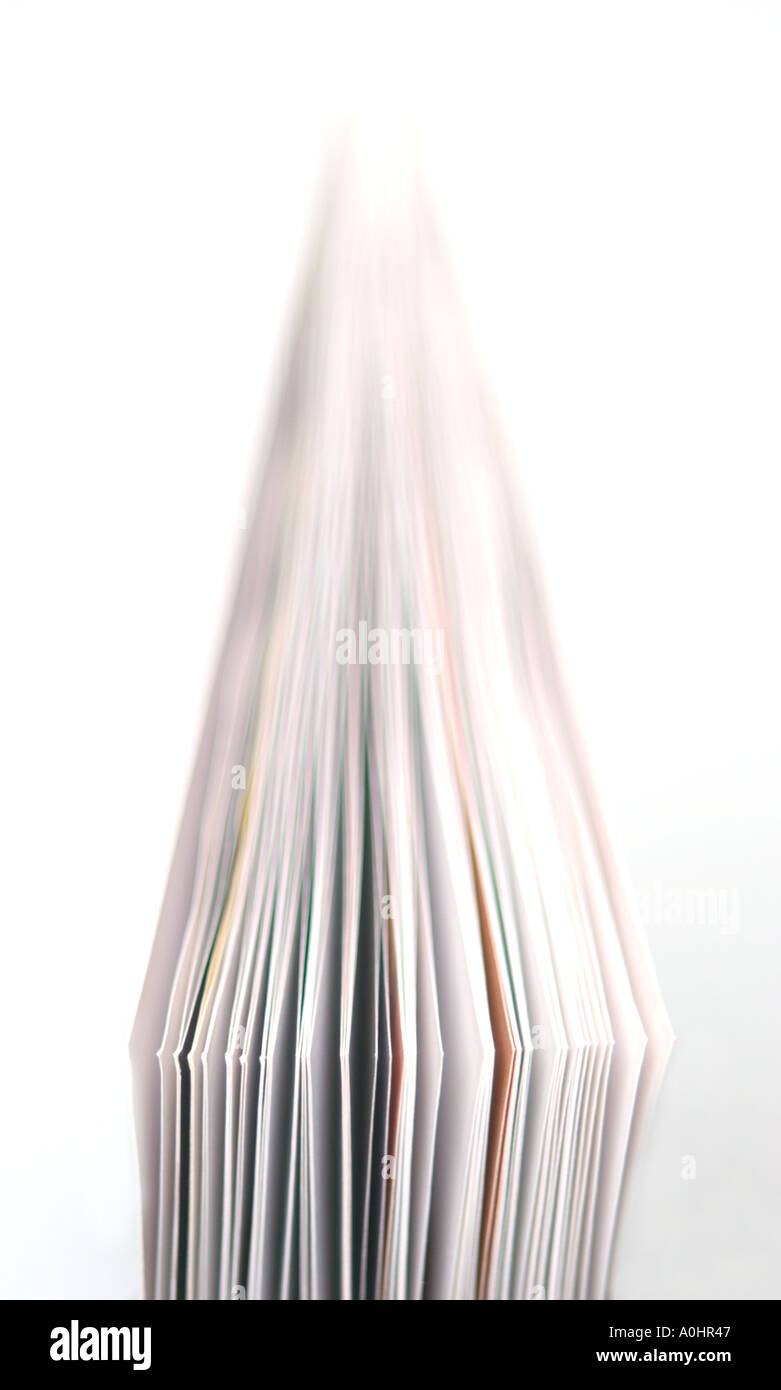 Abstract image of a single book on a white background Stock Photo - Alamy