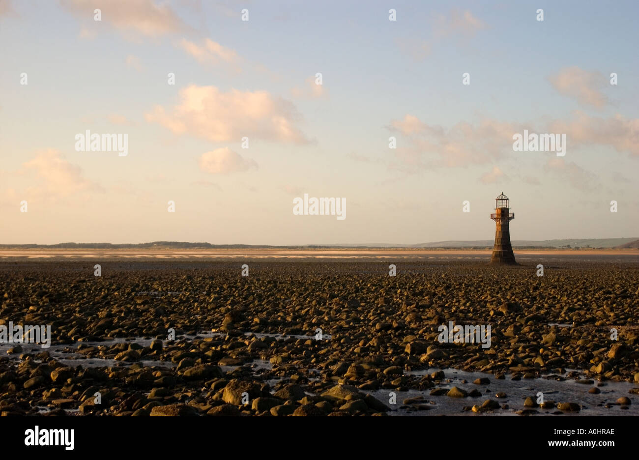 Whitford Point lighthouse at low tide on the Gower Peninsular, South ...