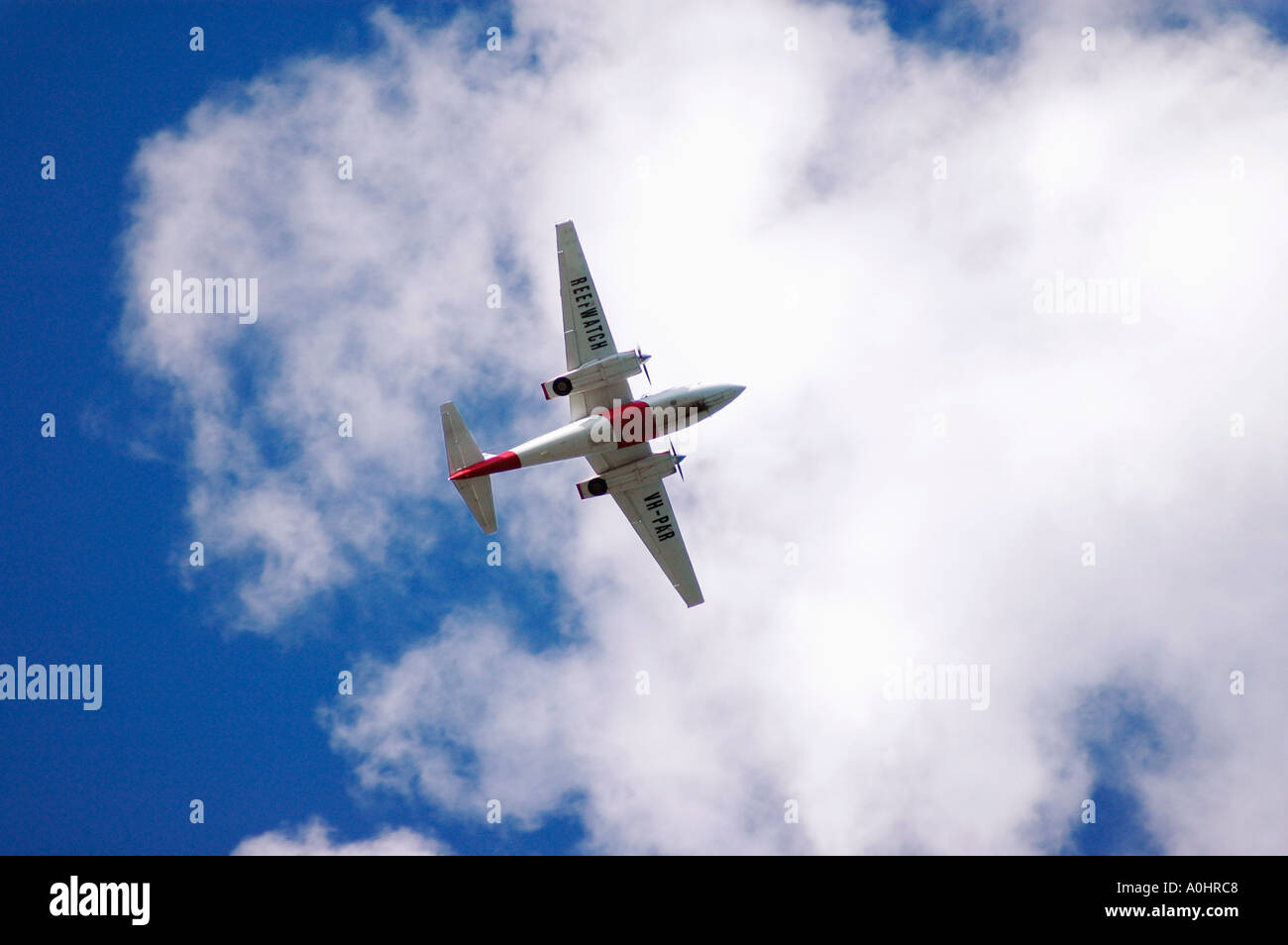 Reefwatch airplane fies over the Great Barrier Reef Stock Photo - Alamy