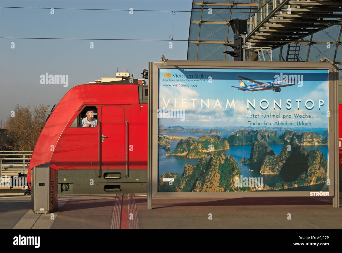 Flying ad and locomotive in the central train station, Berlin, Germany ...