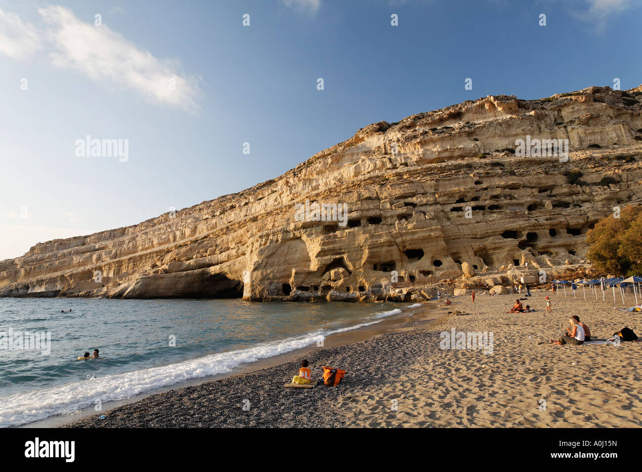 Matala beach and rock caves, Southcrete, Crete, Greece Stock Photo - Alamy