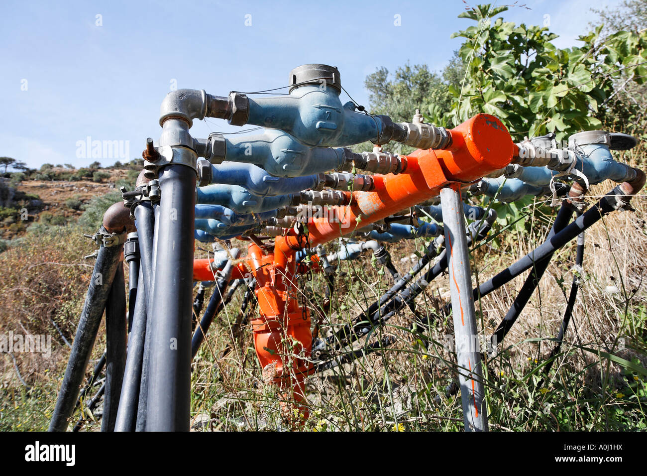 Water meters and pipes for irrigation, Crete, Greece Stock Photo - Alamy