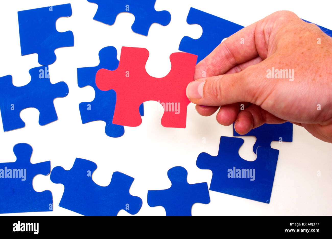 Jigsaw pieces fitting together hi-res stock photography and images - Alamy