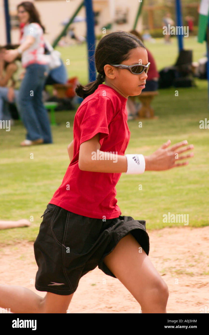 School girl running on sports day Stock Photo - Alamy
