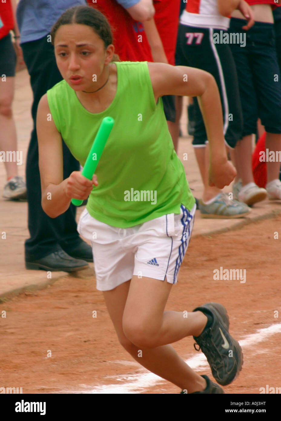School girl running on sports day Stock Photo - Alamy