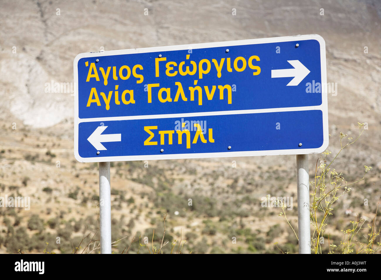 Direction sign in greek language at street in Crete, Greece Stock Photo ...