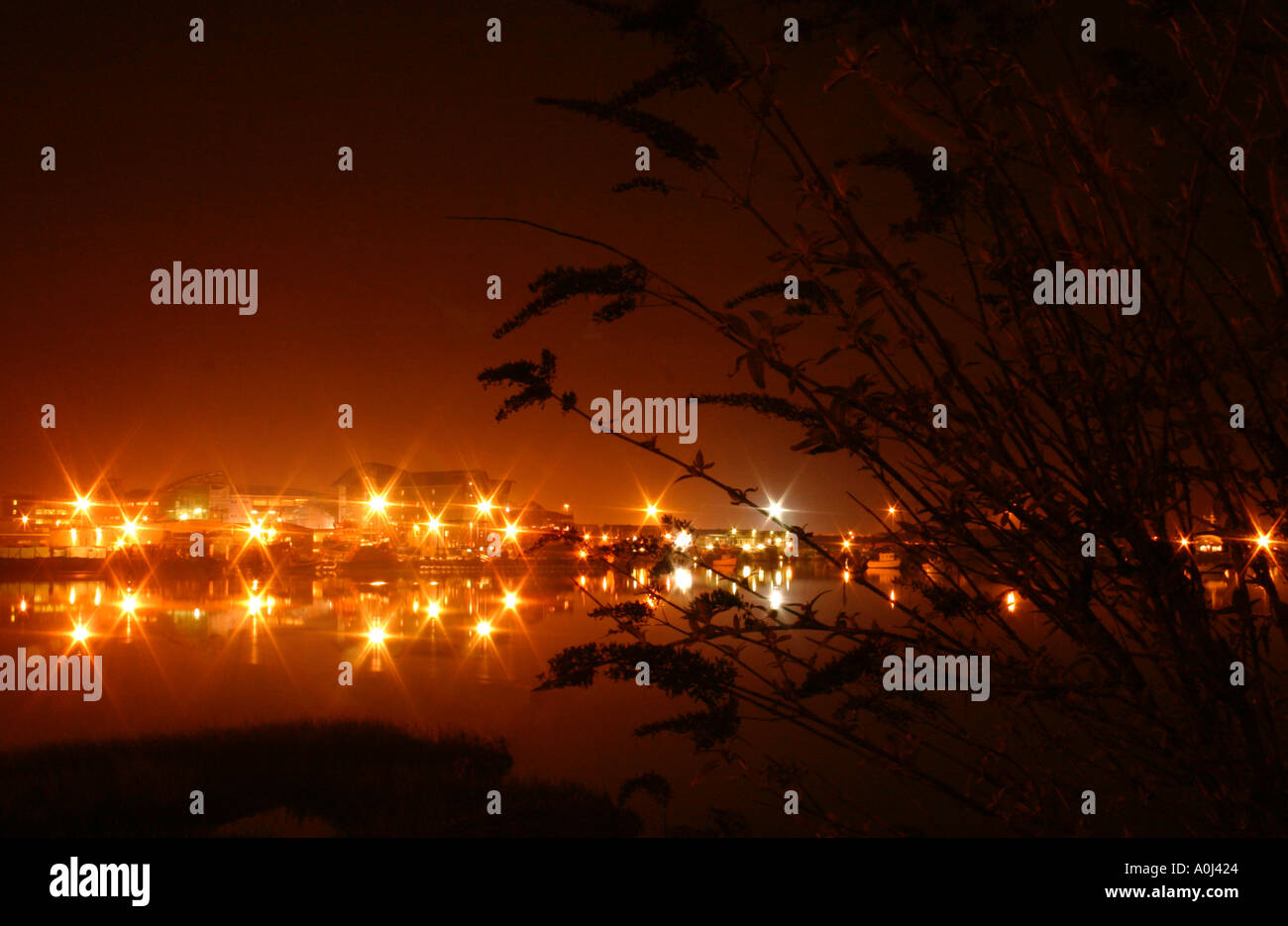 Lights reflection on the evening water Stock Photo - Alamy
