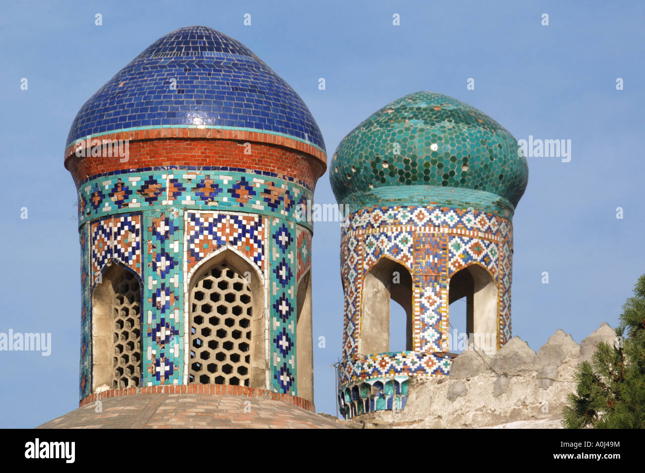 Towers covered with colorful mosaic Uzbekistan Stock Photo - Alamy