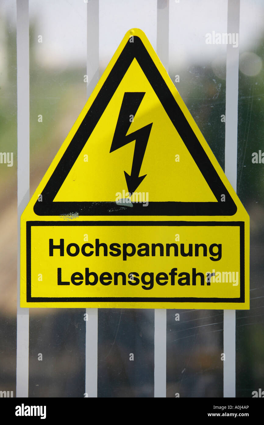 Warning high voltage, danger of life Stock Photo - Alamy