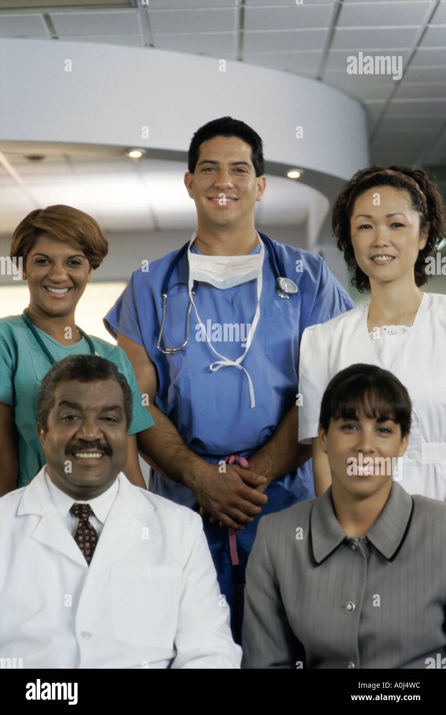 Portrait of a group of medical personnel smiling Stock Photo - Alamy