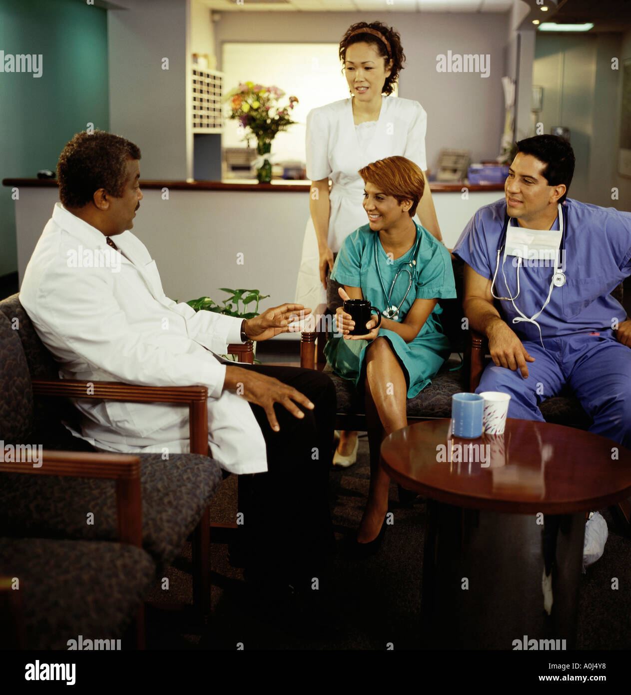 Medical personnel talking, standing hi-res stock photography and images ...