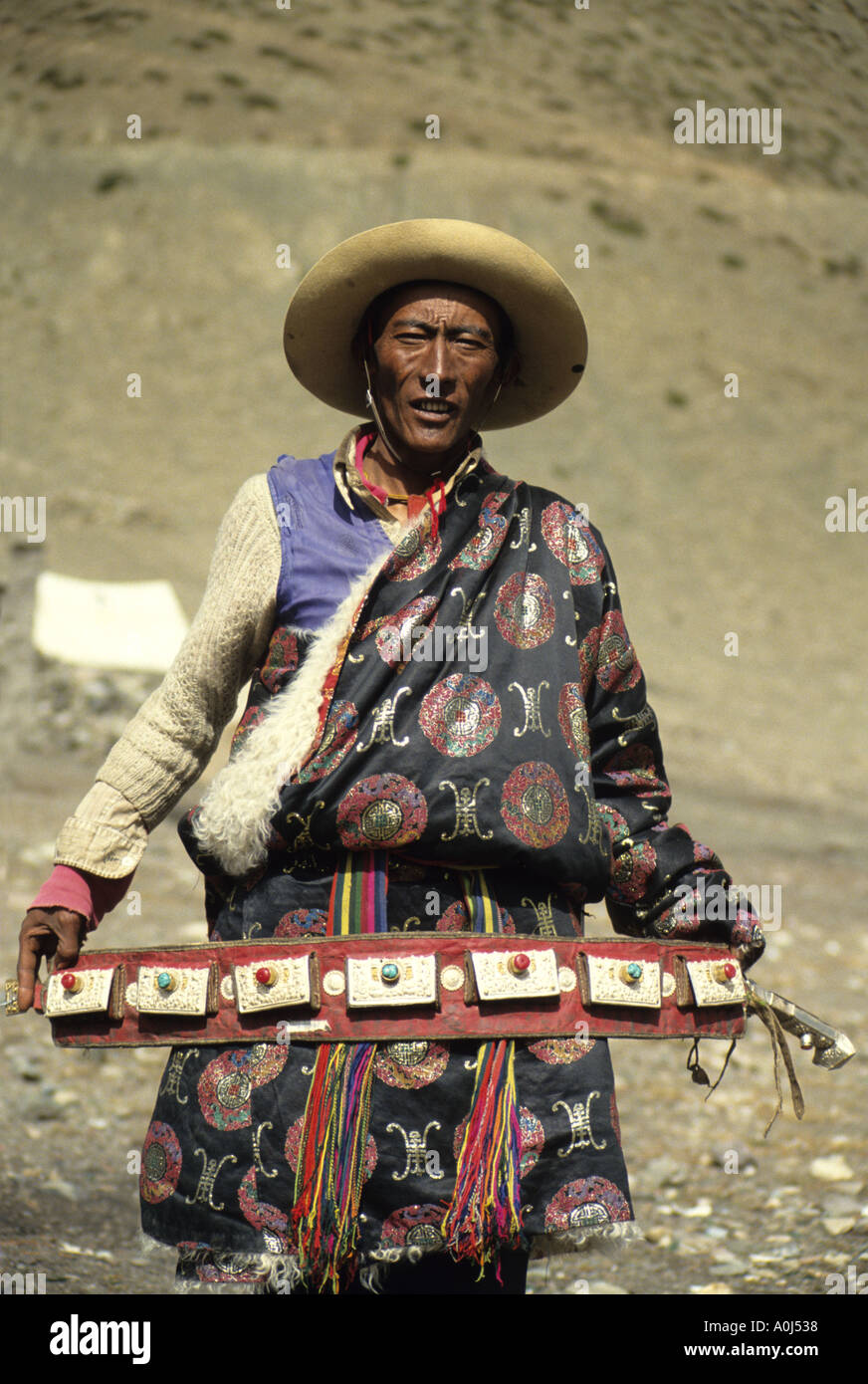 Tibetan pilgrim displaying his jeweled belt,Tibet,China Stock Photo - Alamy