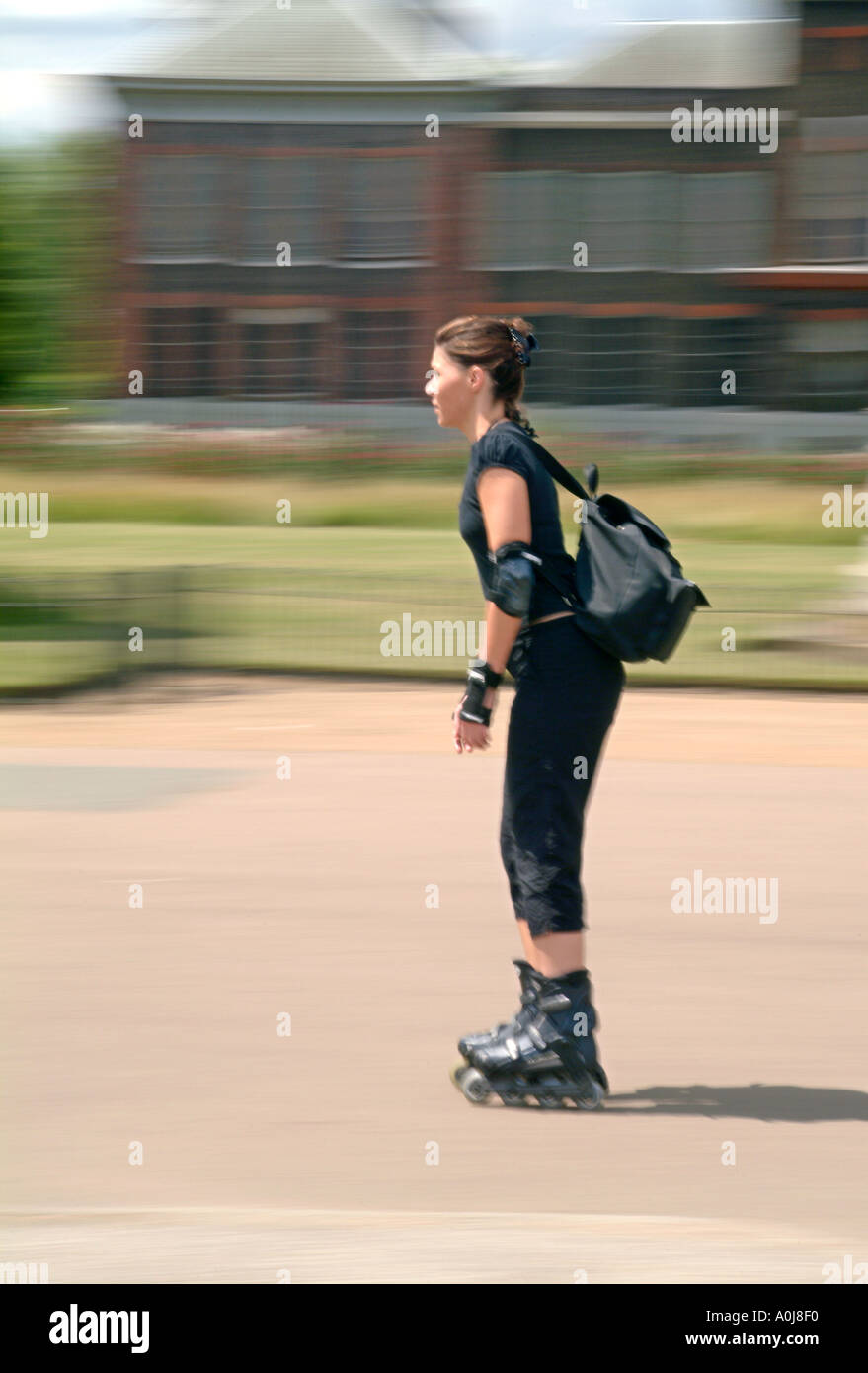 Woman roller blading hi-res stock photography and images - Alamy