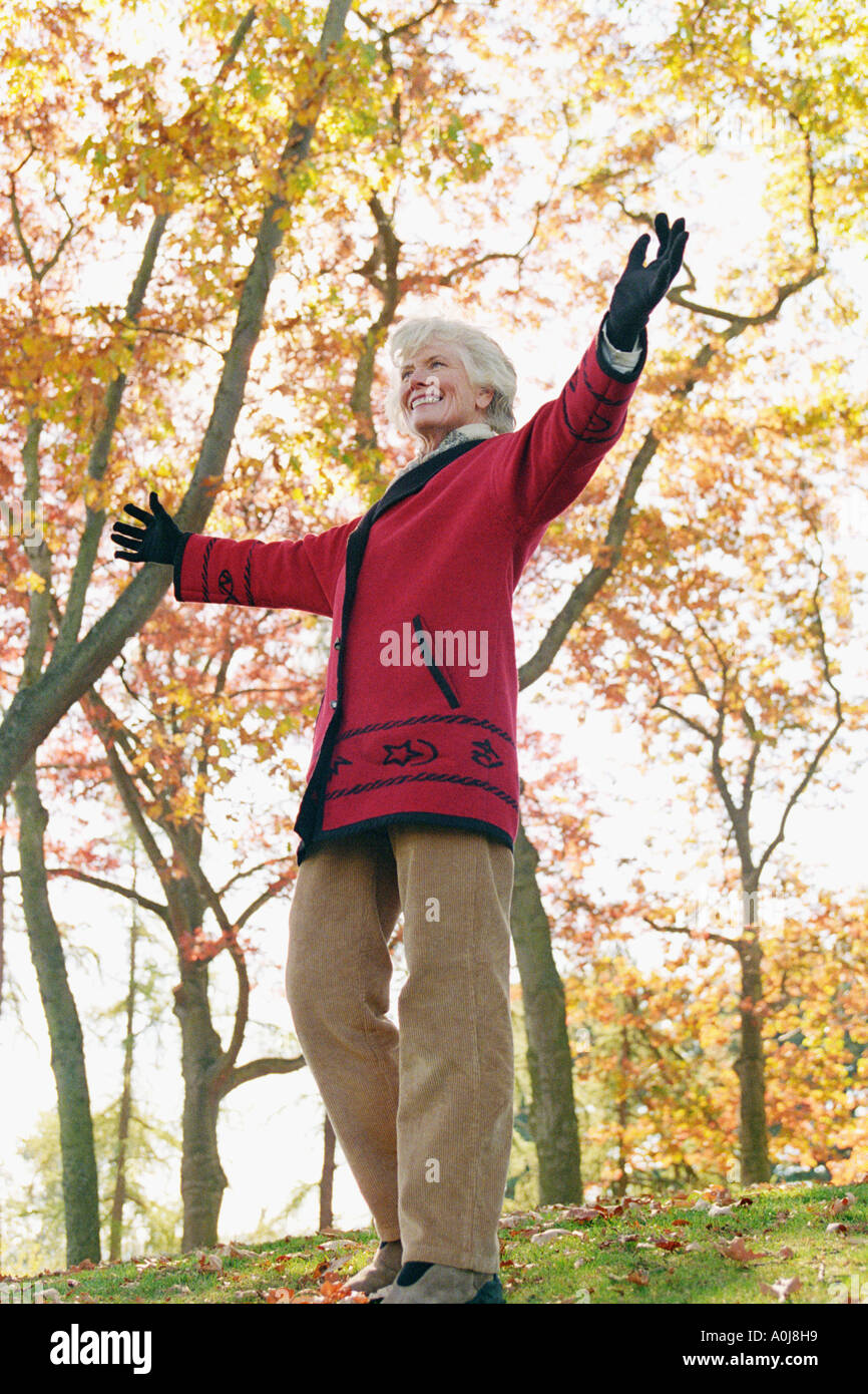 Mature woman enjoying a Fall day Stock Photo - Alamy