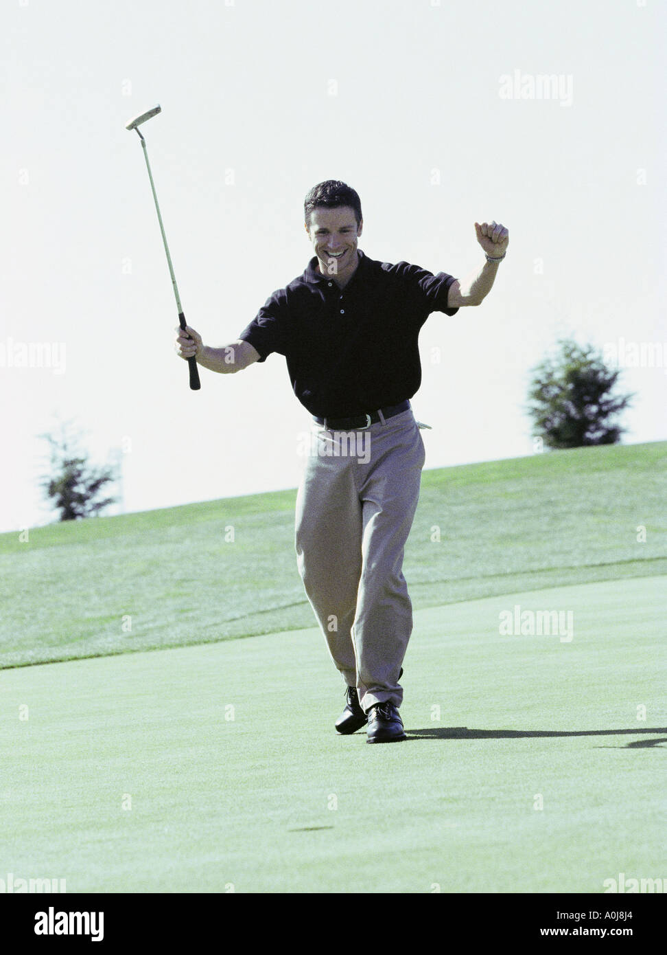 Action celebrating golfers hi-res stock photography and images - Alamy