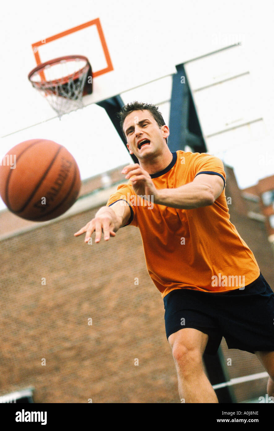 Passing basketball hi-res stock photography and images - Alamy