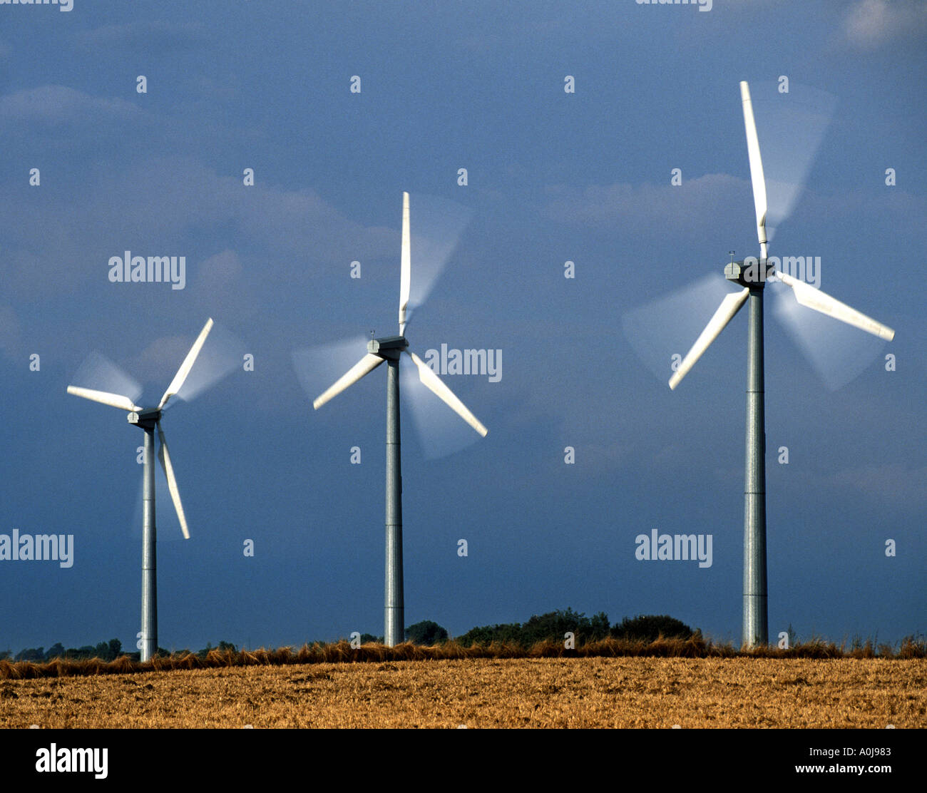 Denmark Three wind powered generators Stock Photo - Alamy