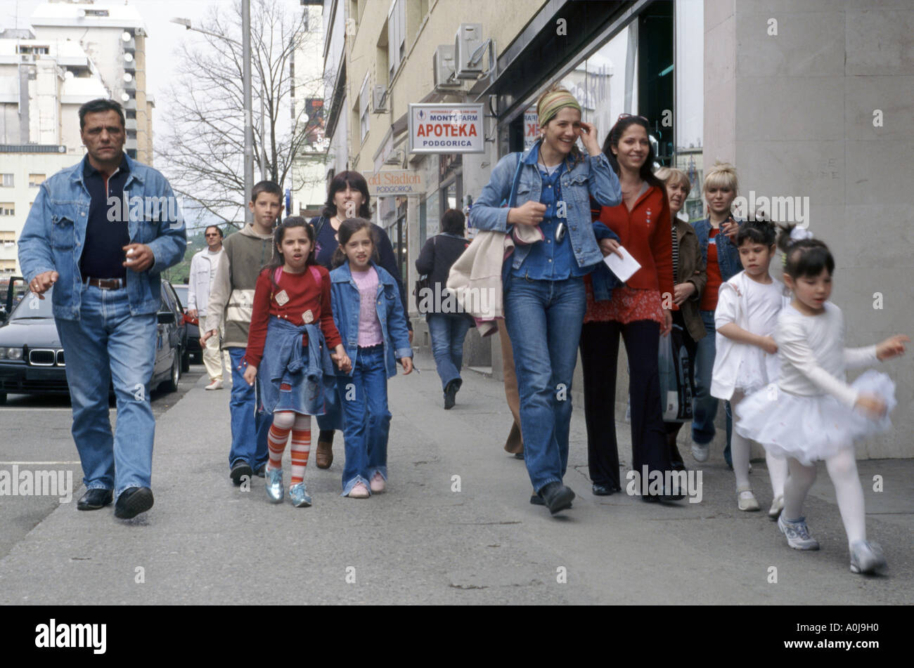 Family at Slobode Street in Podgorica, former Titograd, Montenegro ...