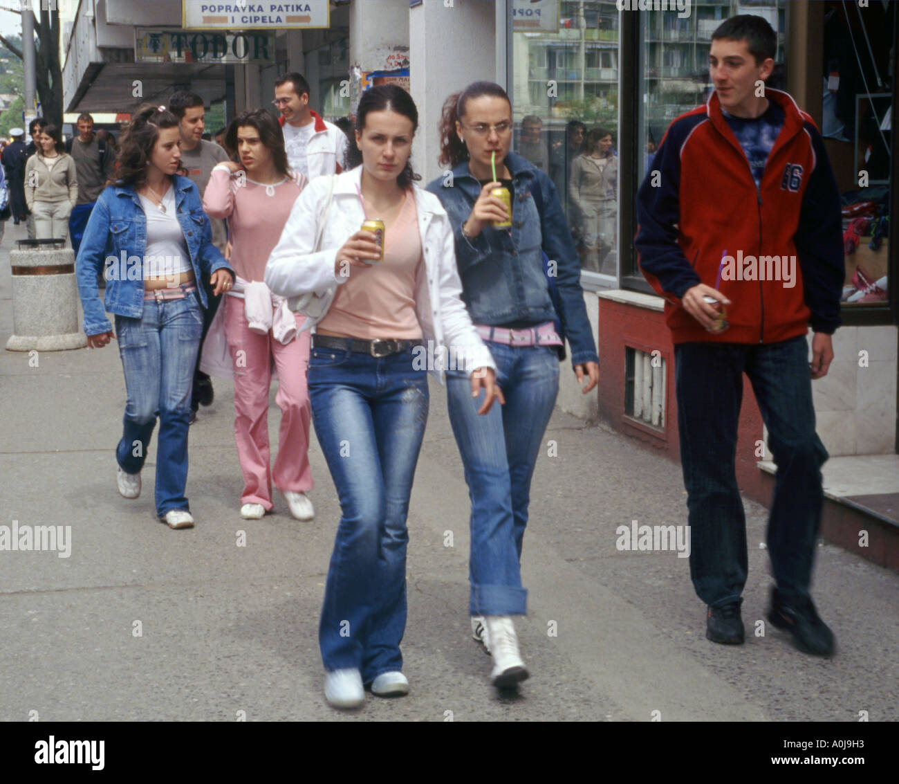 Passersby at Slobode Street in Podgorica, former Titograd, Montenegro ...