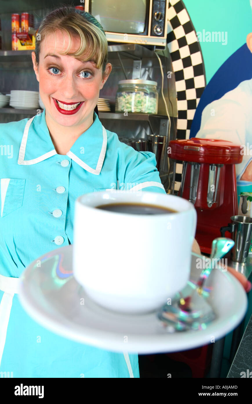 Cheerful Waitress Serving Coffee in Diner Stock Photo - Alamy