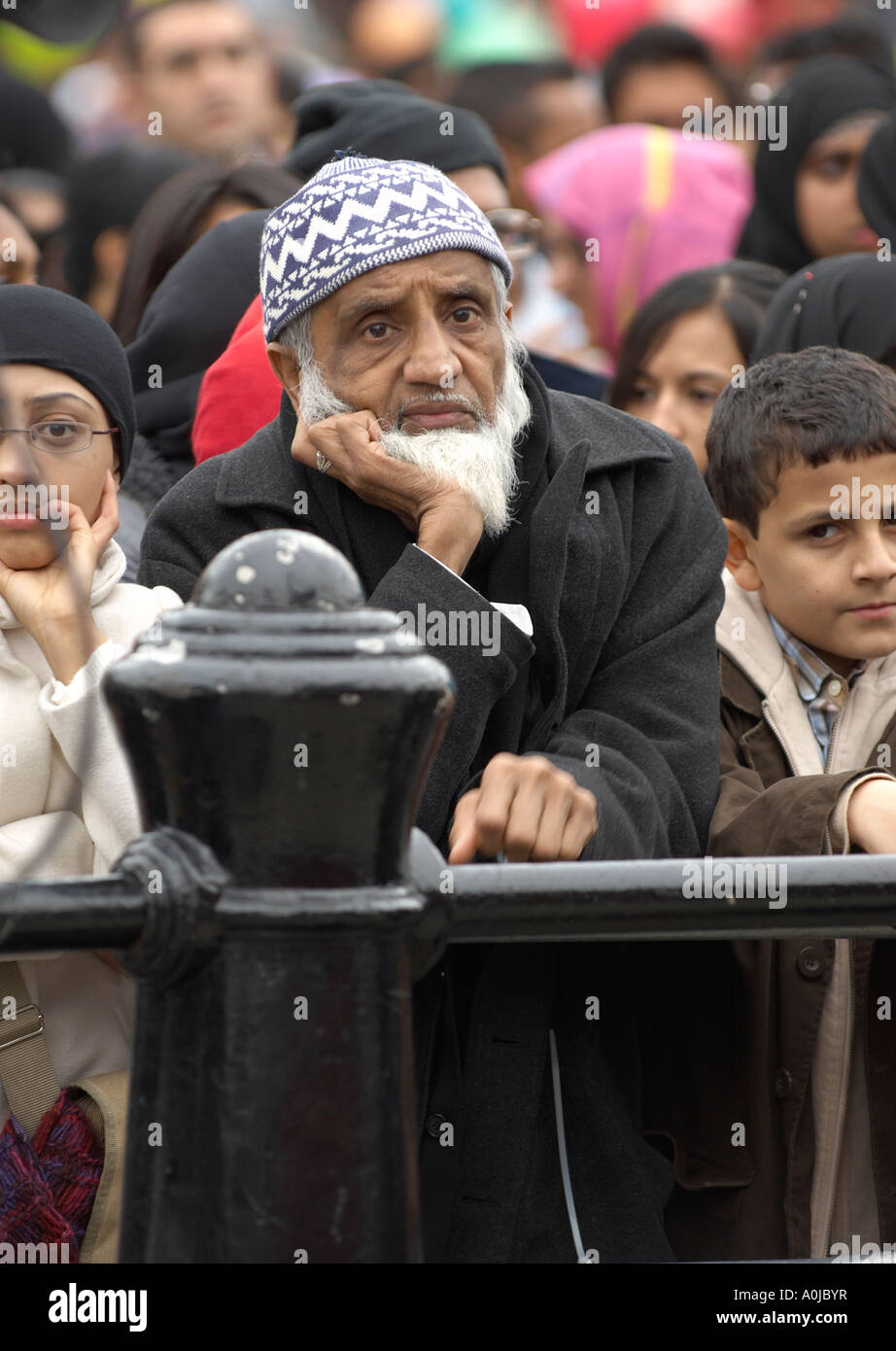 Muslim man in the crowd at Eid in the Square, Trafalgar Square, London ...