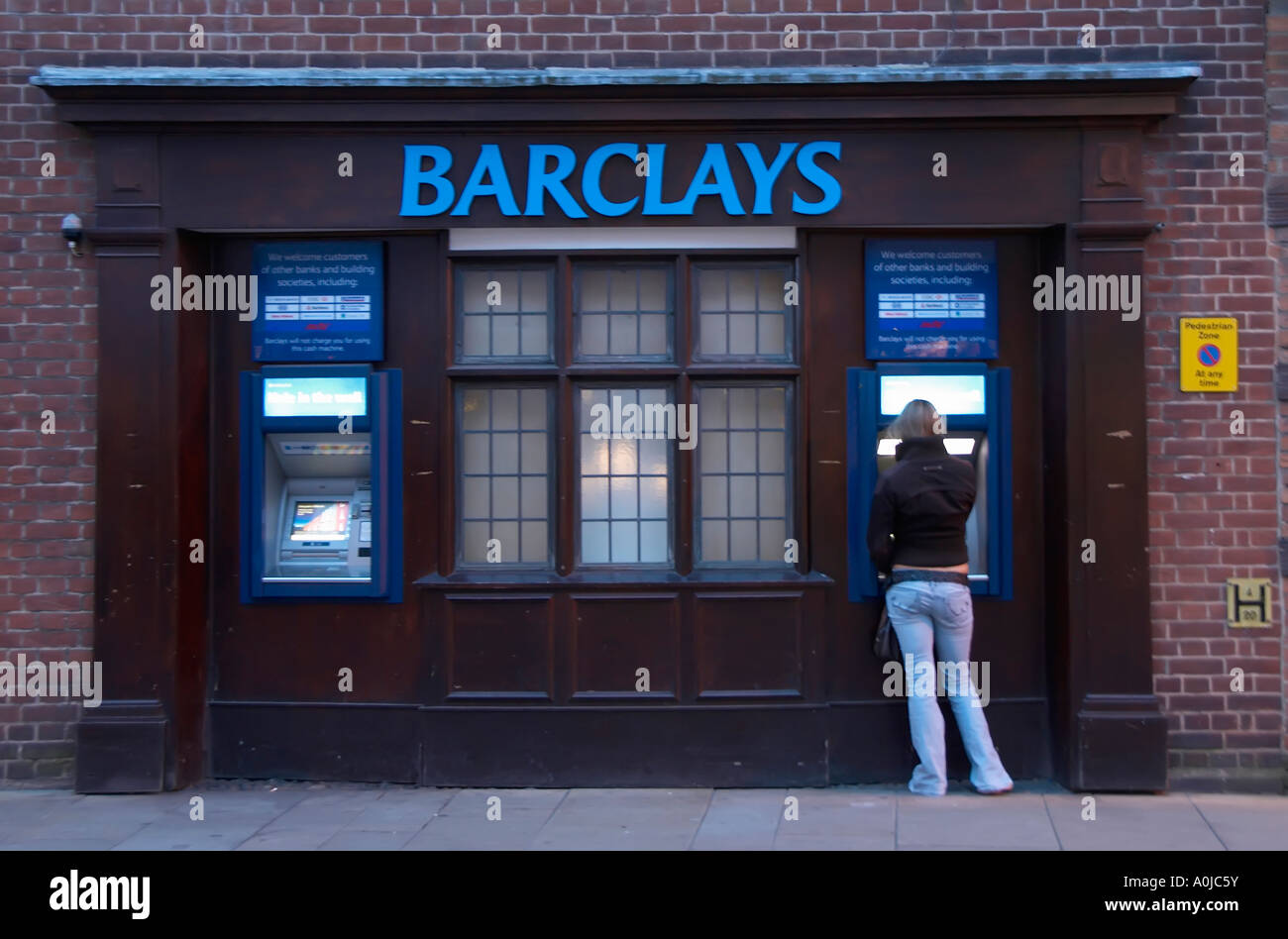 Barclays bank cash woman hi-res stock photography and images - Alamy