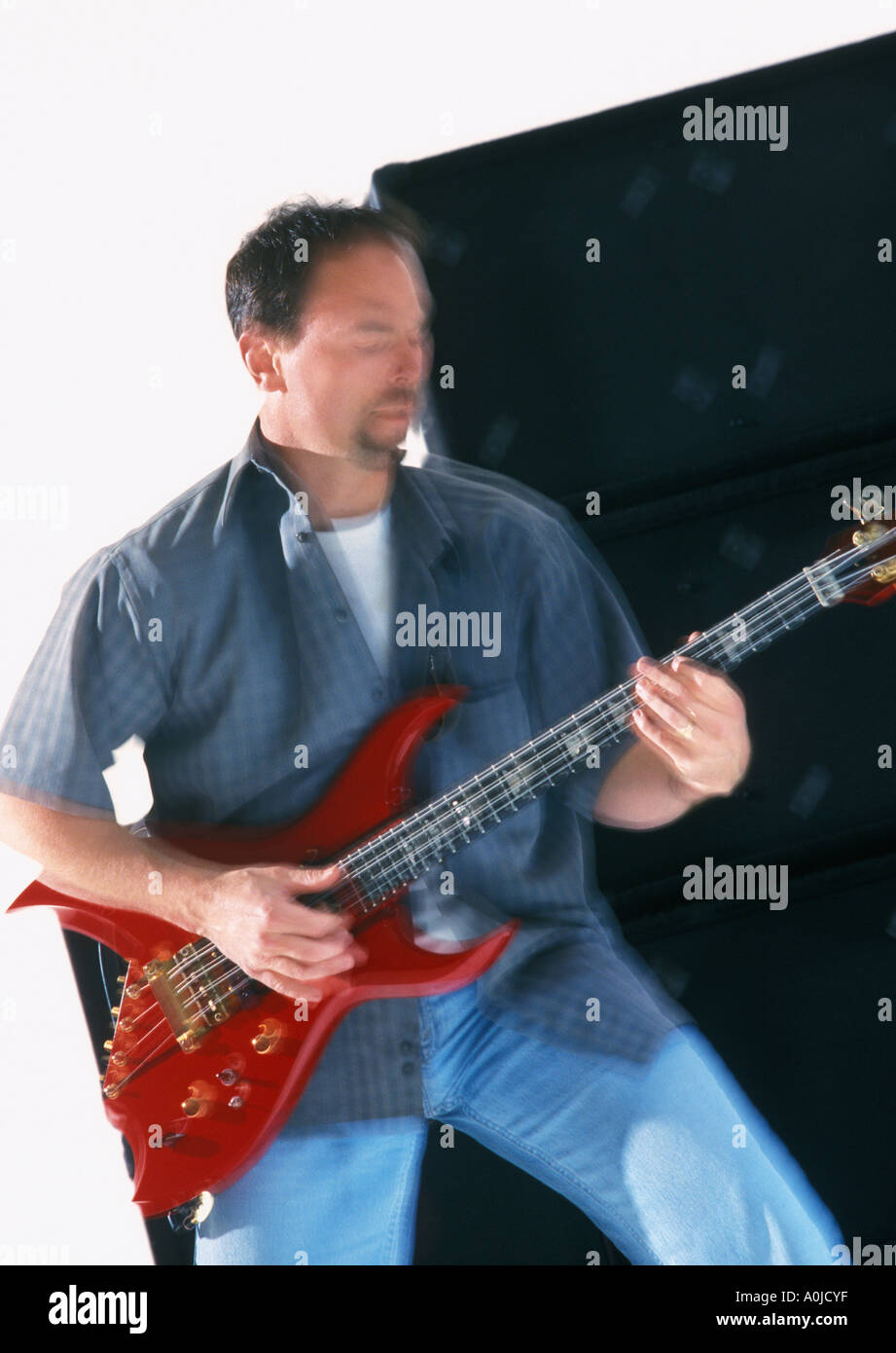 Brown hair bass guitar hi-res stock photography and images - Alamy