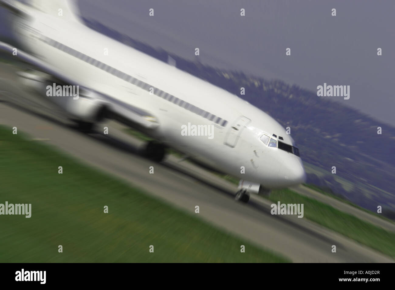 Generic white jet airliner passenger commercial aircraft taking off on ...
