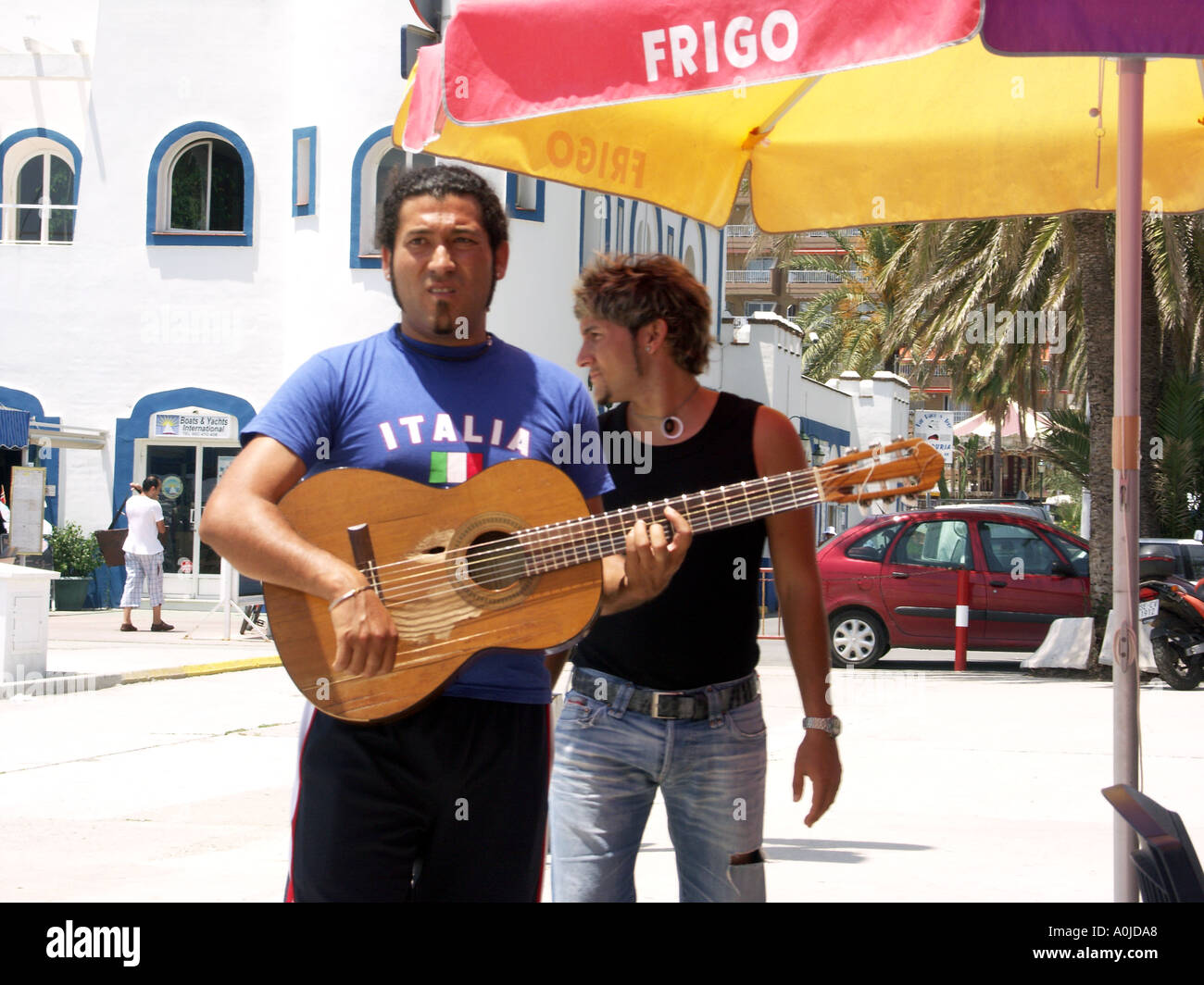 Busker buskers guitar player players musician musicians music entertain ...