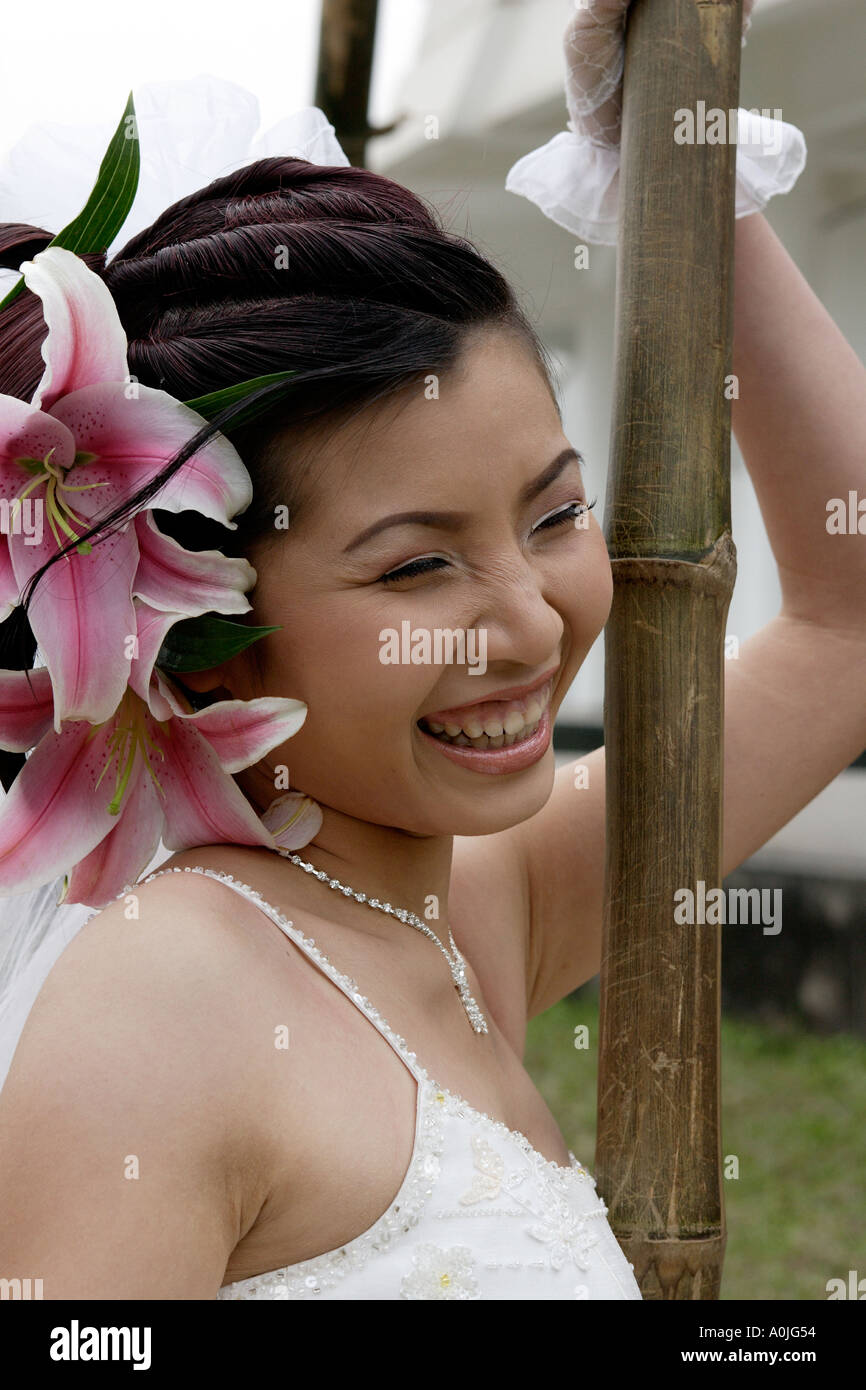 A young Vietnamese bride poses for her wedding picture in Hanoi Vietnam ... A young Vietnamese bride poses for her wedding picture in Hanoi Vietnam ...