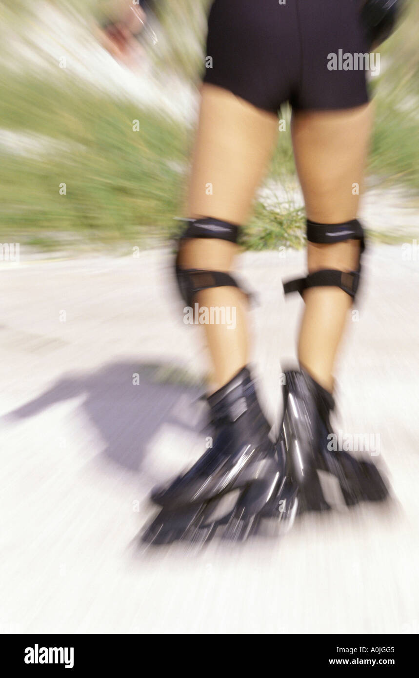 Low section view of a person wearing inline skates Stock Photo - Alamy