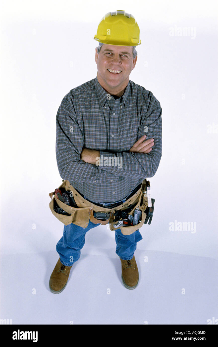 Portrait of a construction worker smiling Stock Photo - Alamy