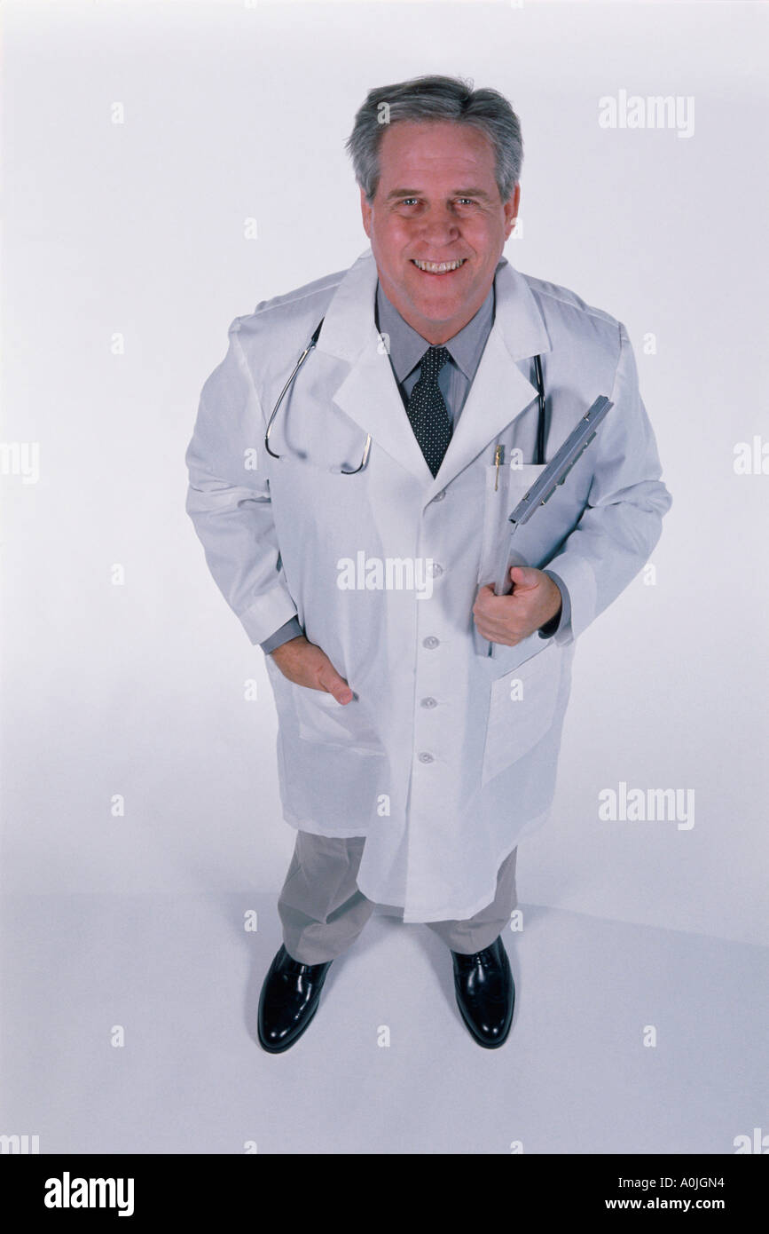 Portrait doctor standing hands hi-res stock photography and images - Alamy
