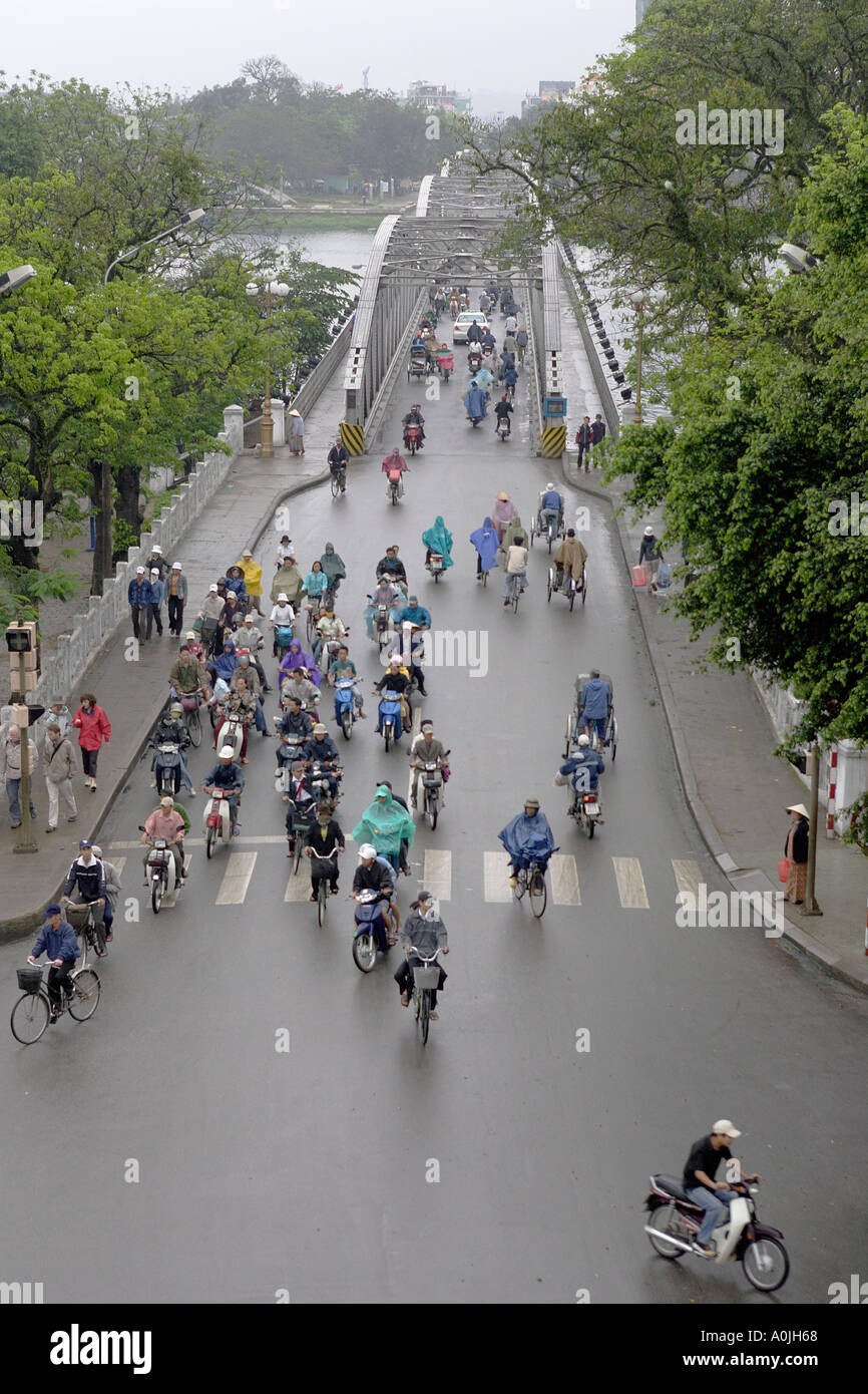 Traffic pours off the Clemenceau Nguyen Hoang Bridge in Hue Vietnam ...