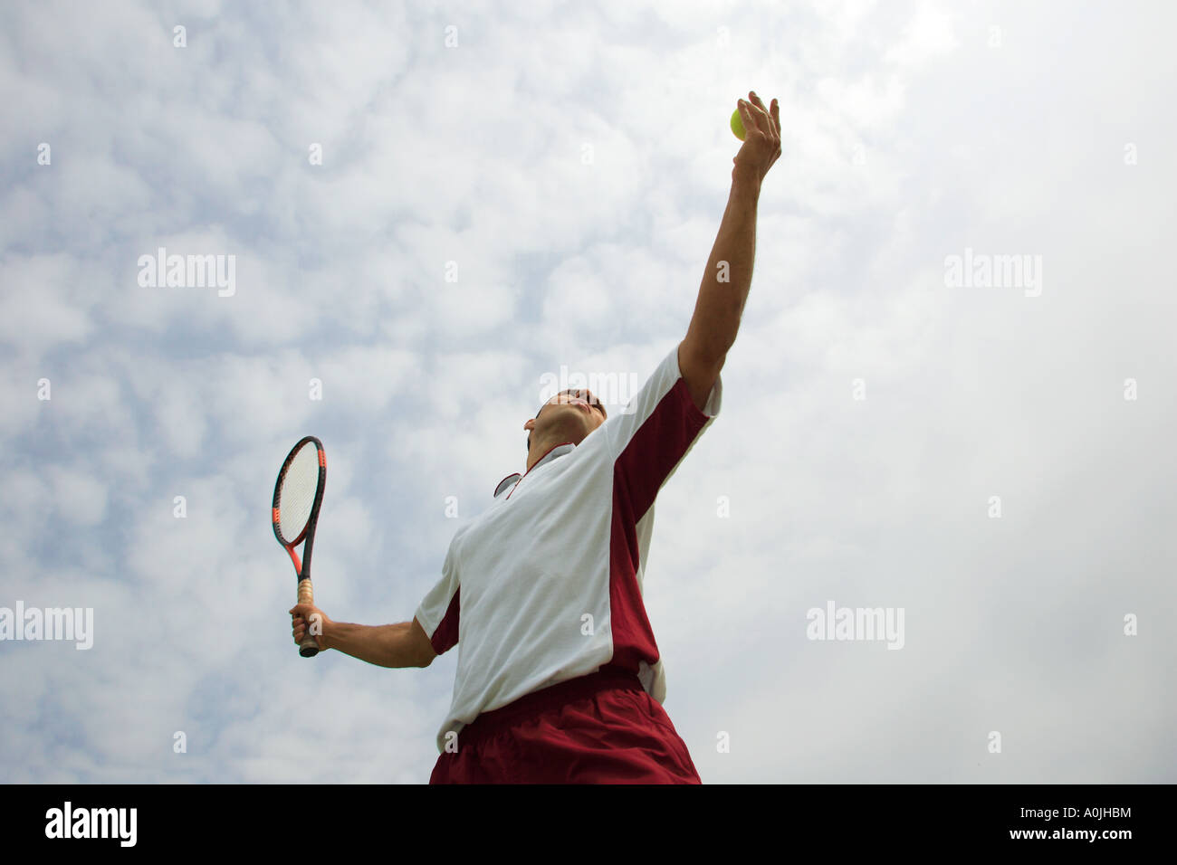 Male Tennis Player Serving Stock Photo - Alamy