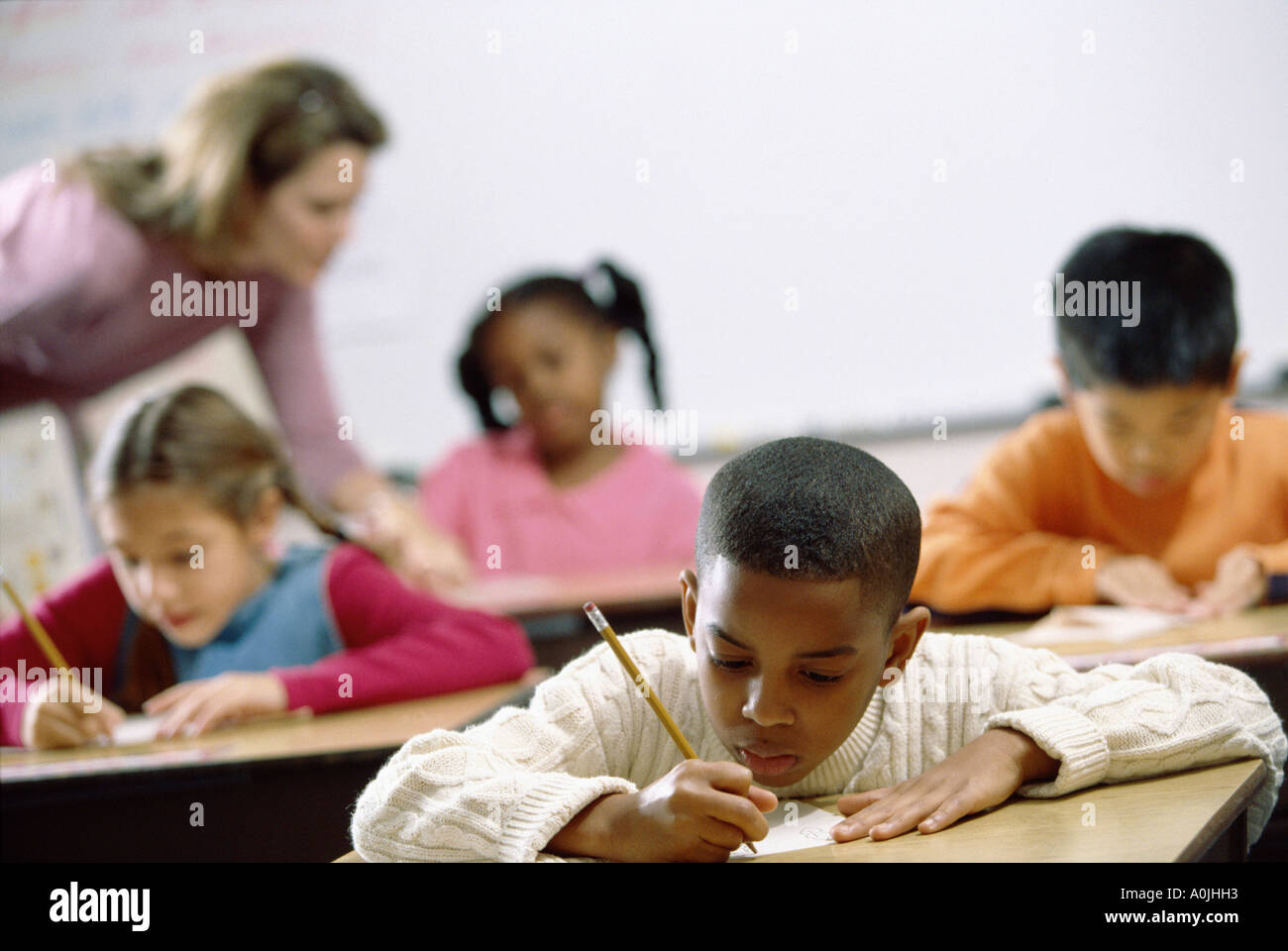 School children in a classroom Stock Photo - Alamy