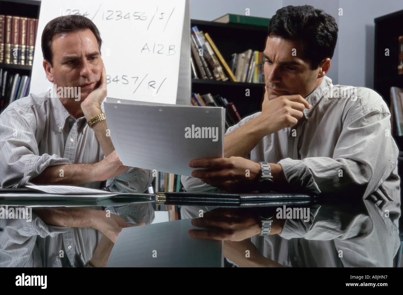 Reading reading two seated hi-res stock photography and images - Alamy