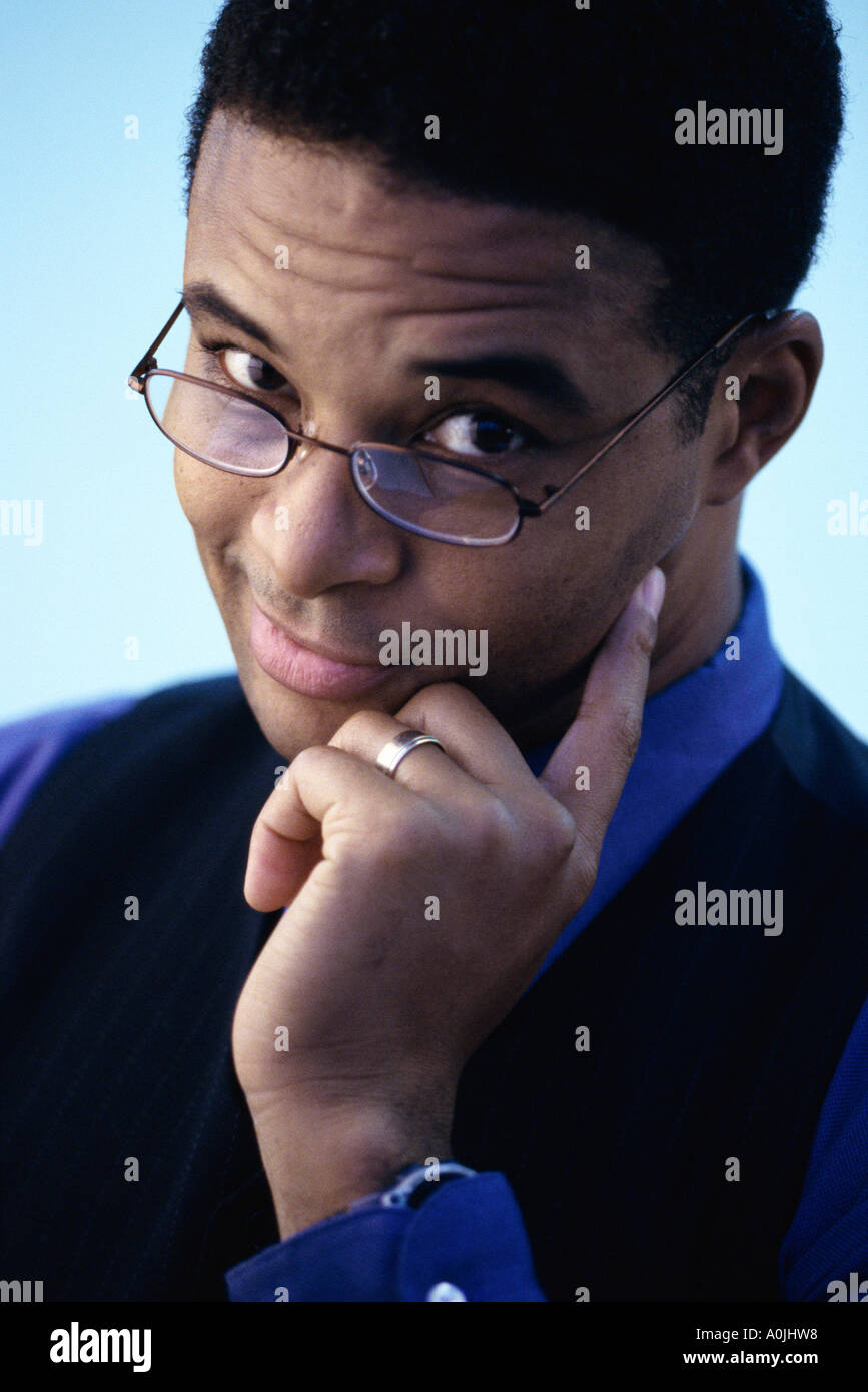 African man smirking hi-res stock photography and images - Alamy